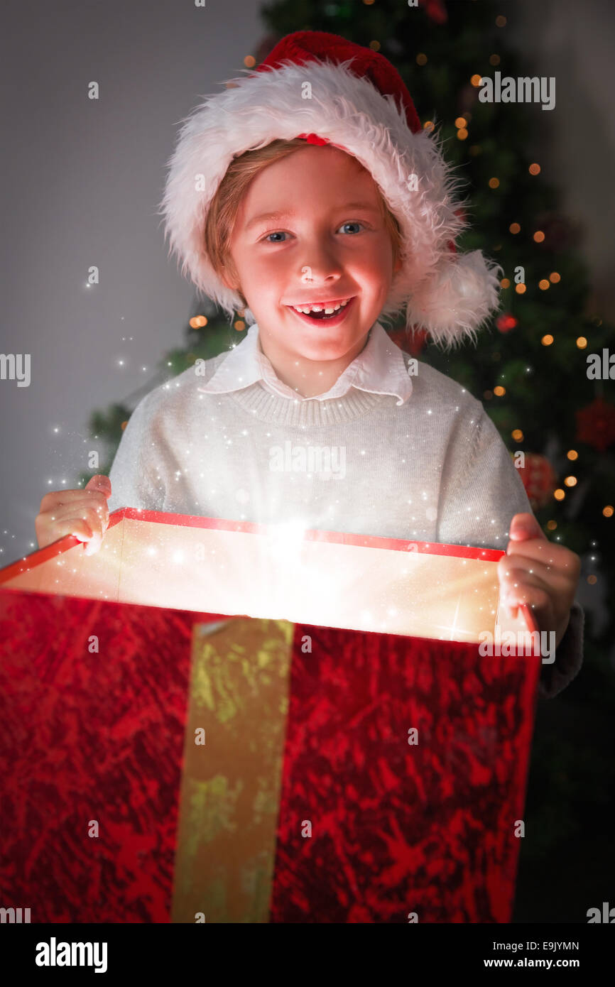 Child opening present hi-res stock photography and images - Alamy