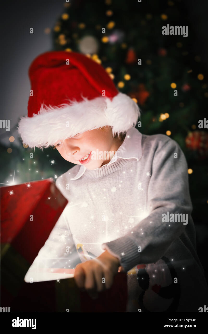 Child opening present hi-res stock photography and images - Alamy