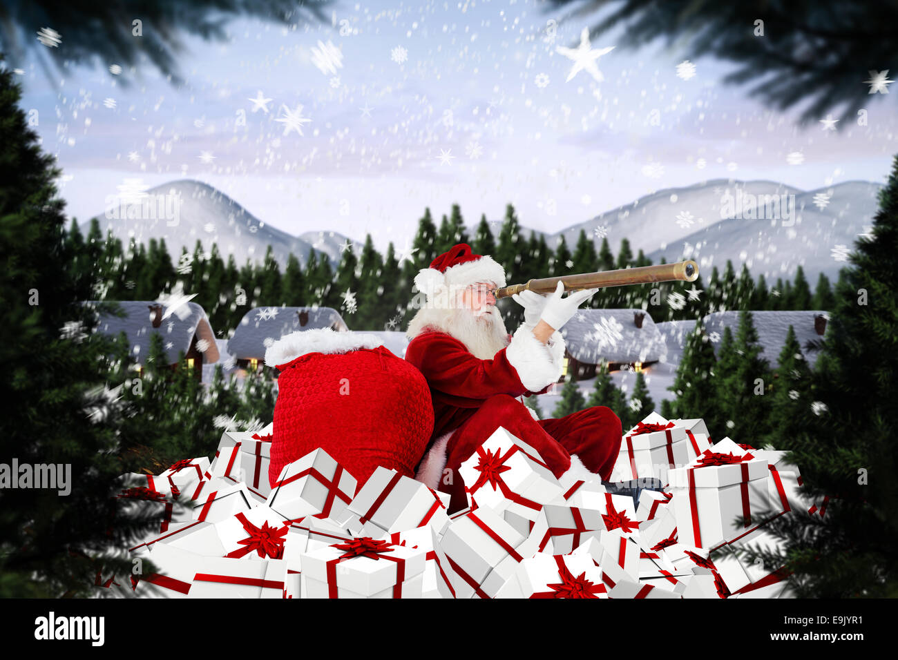 Composite image of santa looking through a telescope Stock Photo - Alamy