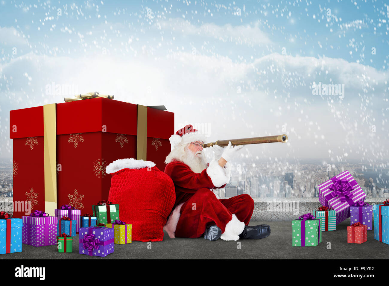 Composite image of santa looking through a telescope Stock Photo - Alamy