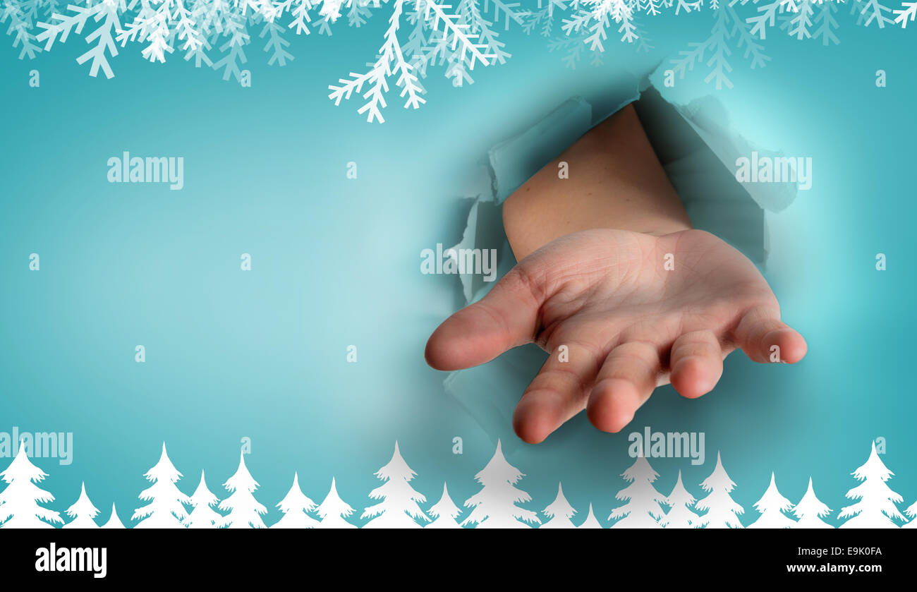 Composite image of hand bursting through paper Stock Photo - Alamy