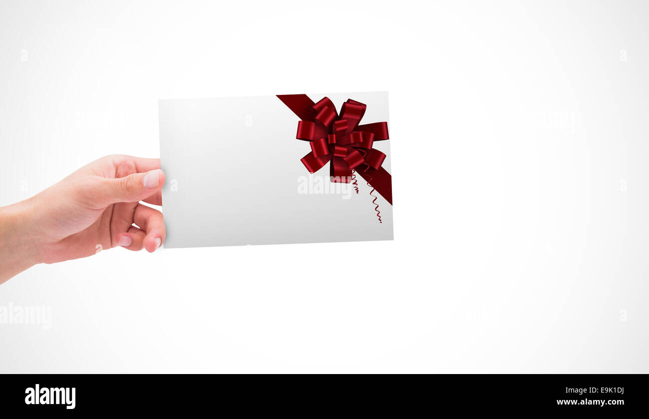 Hand holding gift card hi-res stock photography and images - Alamy