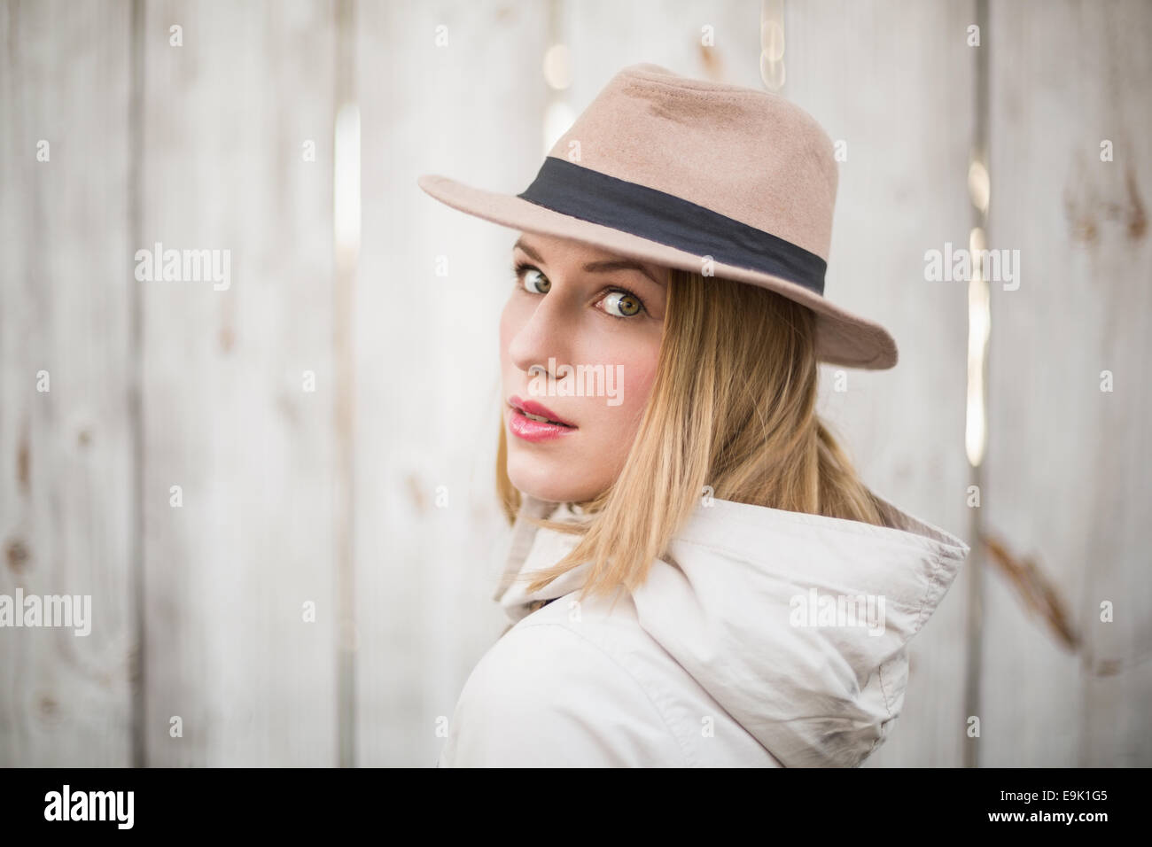 Blonde woman looking over shoulder hi-res stock photography and images ...