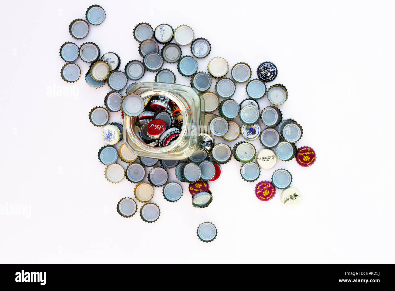 Bottle tops falling Stock Photo - Alamy