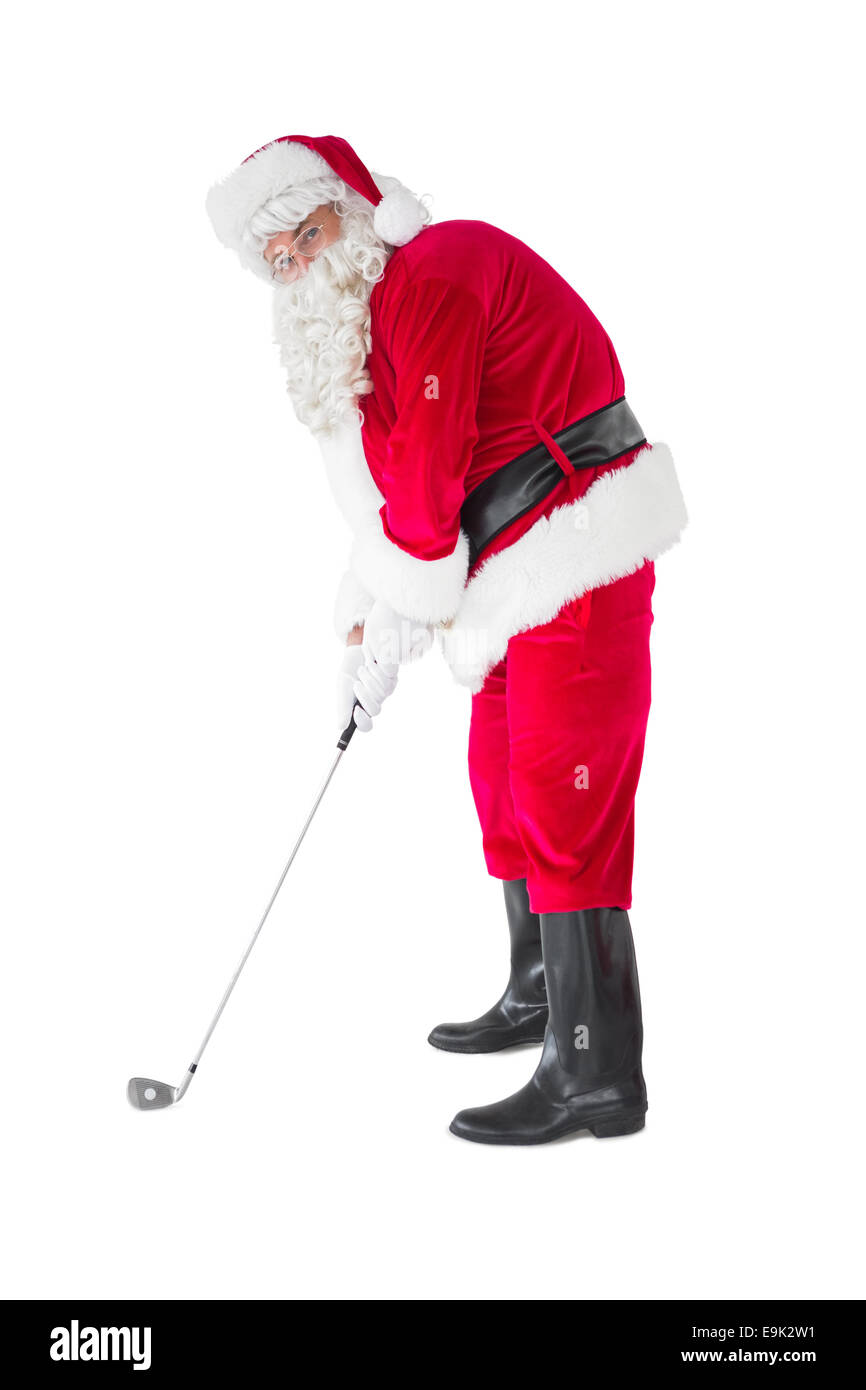 Happy santa claus playing golf Stock Photo - Alamy