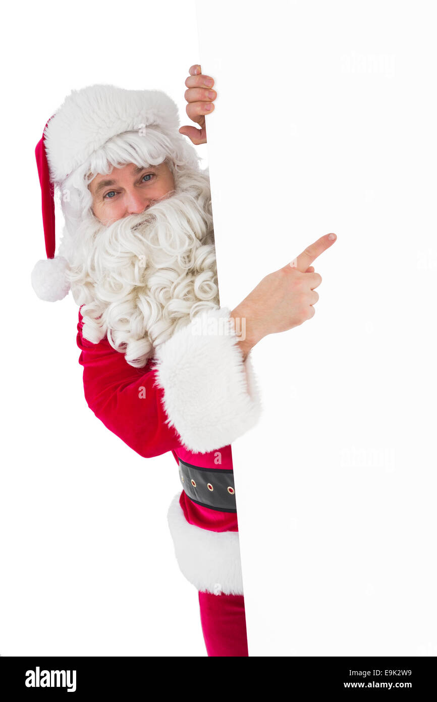 Joyful father christmas presenting sign Stock Photo - Alamy