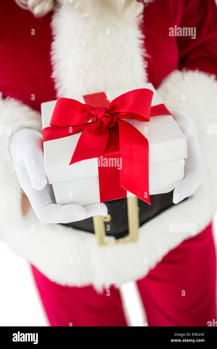 Santa holding present hi-res stock photography and images - Alamy