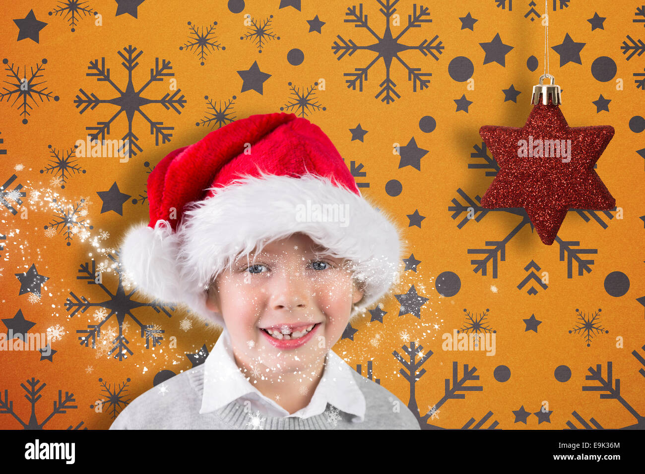 Composite image of festive boy smiling Stock Photo - Alamy