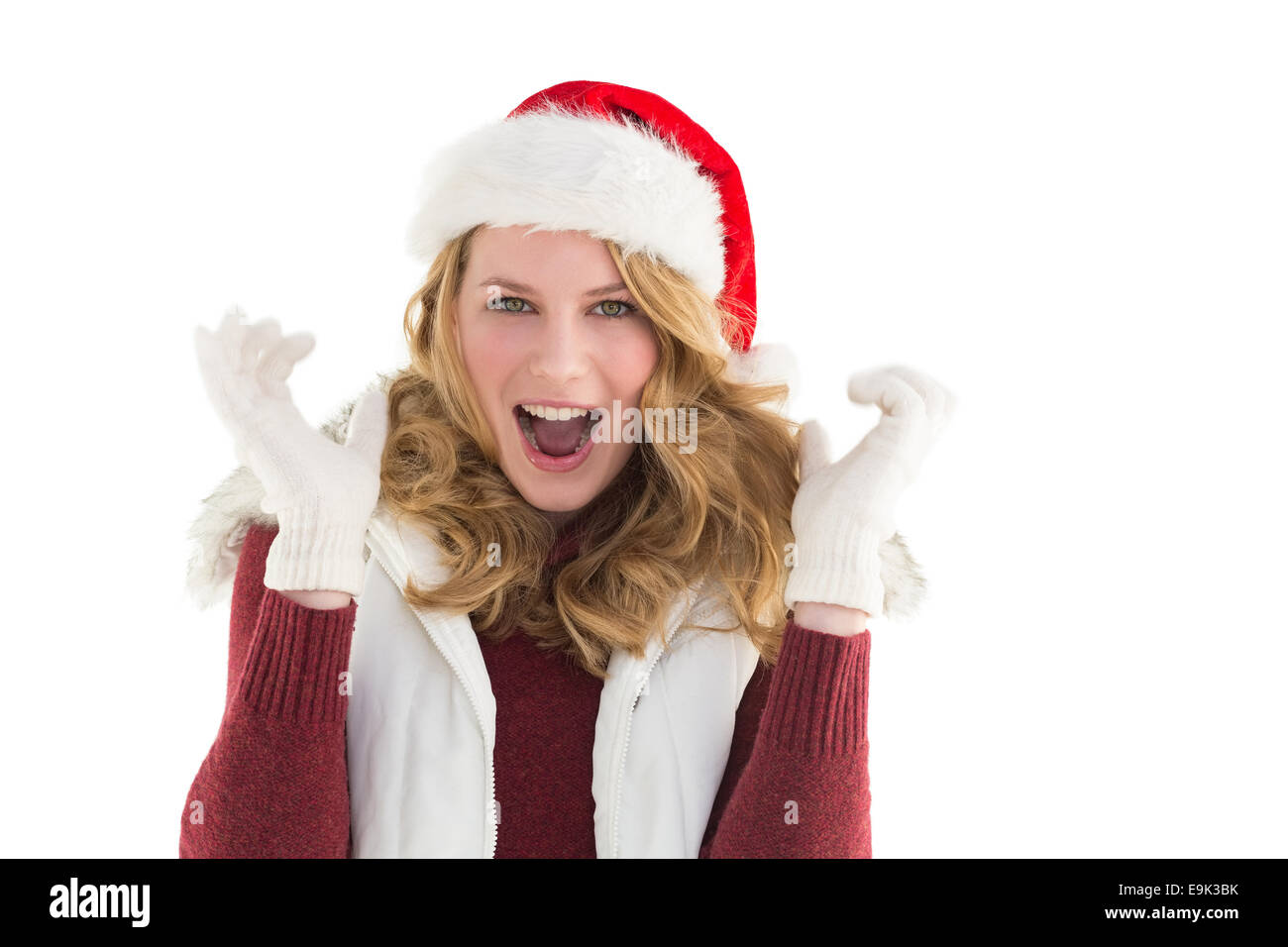 Blonde woman in santa hat screaming at camera Stock Photo - Alamy