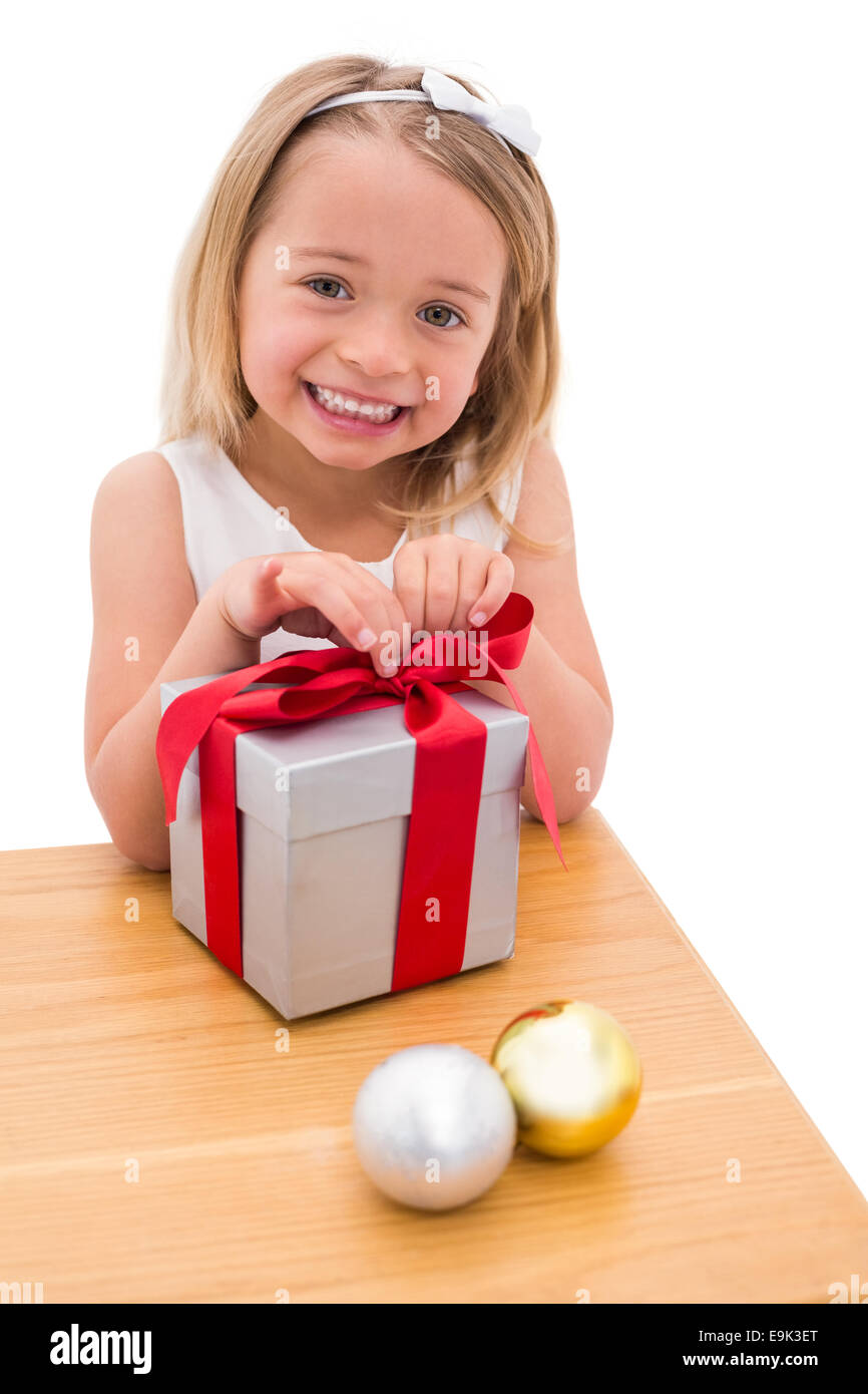 Festive little girl opening a gift Stock Photo - Alamy Festive little girl opening a gift Stock Photo - Alamy