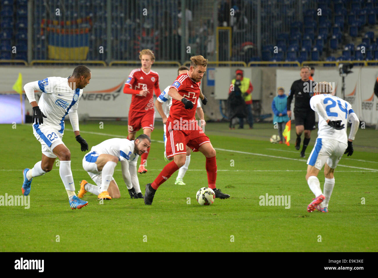 Erіk BІKFALVІ (in red) and FC Dnipro players during the match between ...
