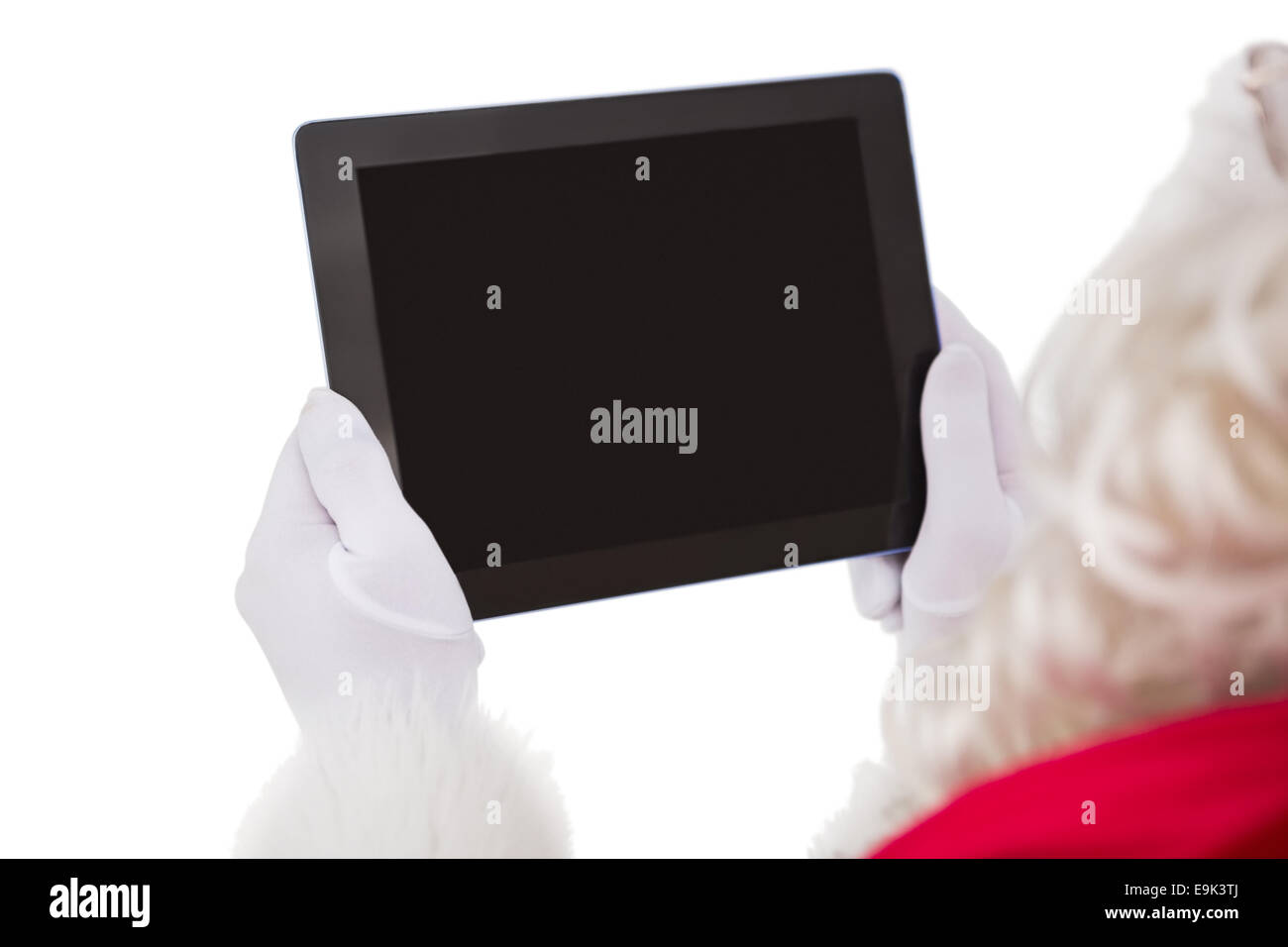 Santa claus using tablet pc Stock Photo - Alamy