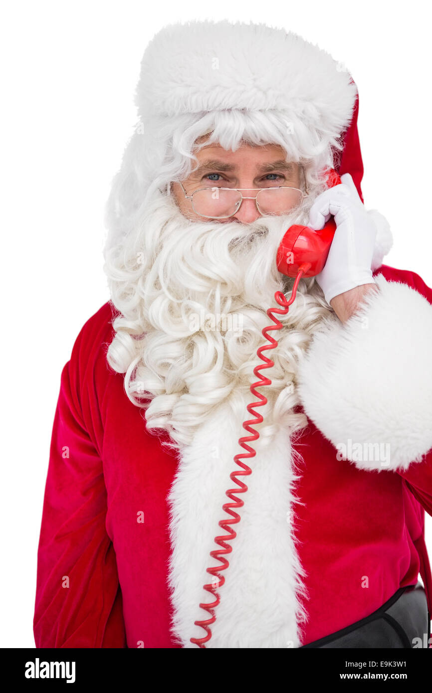 Smiling santa claus on the phone Stock Photo - Alamy