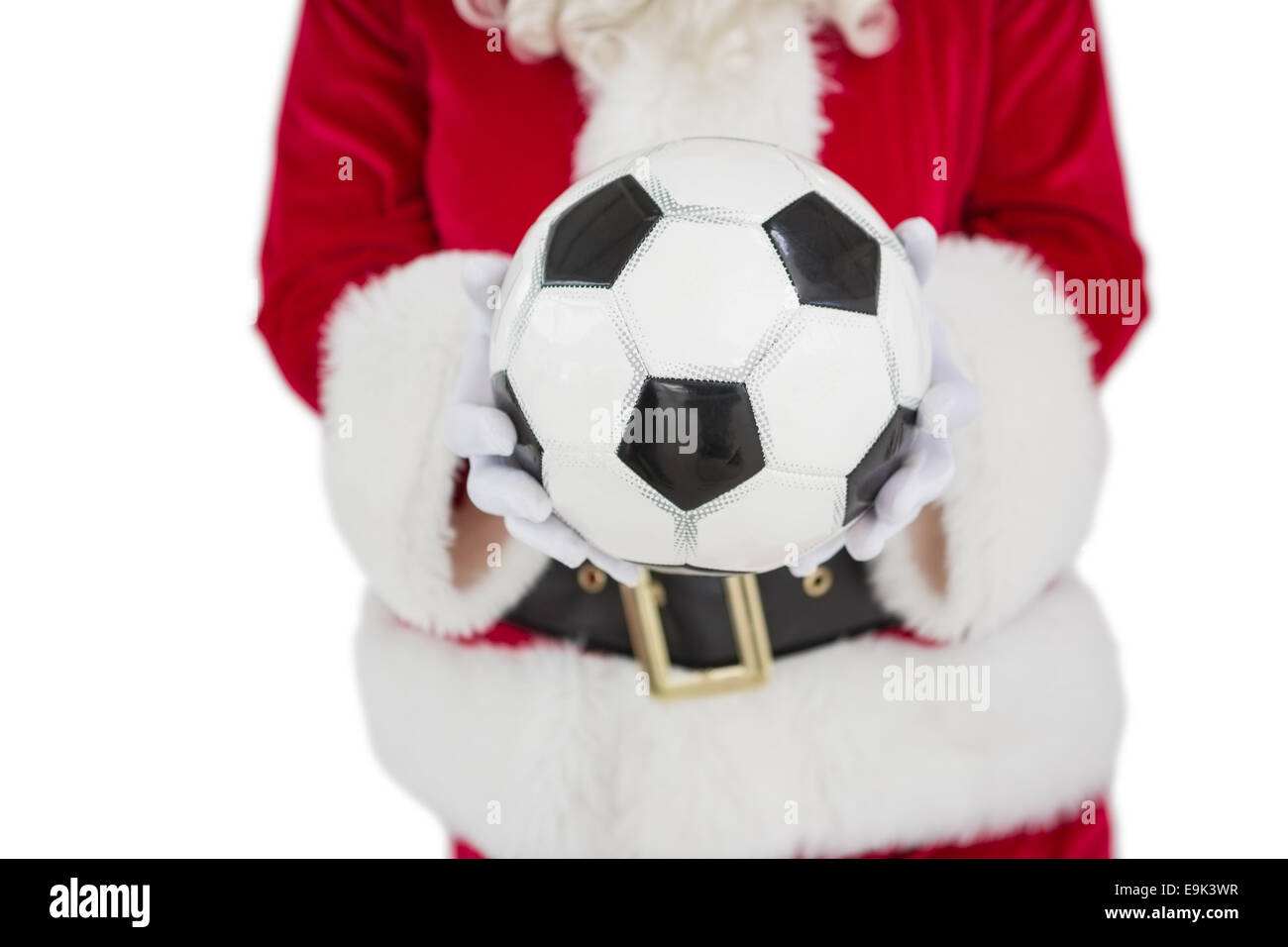Mid section of santa holding football Stock Photo - Alamy