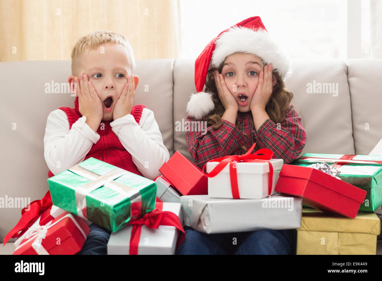 Christmas tree surrounded with gifts hi-res stock photography and ...