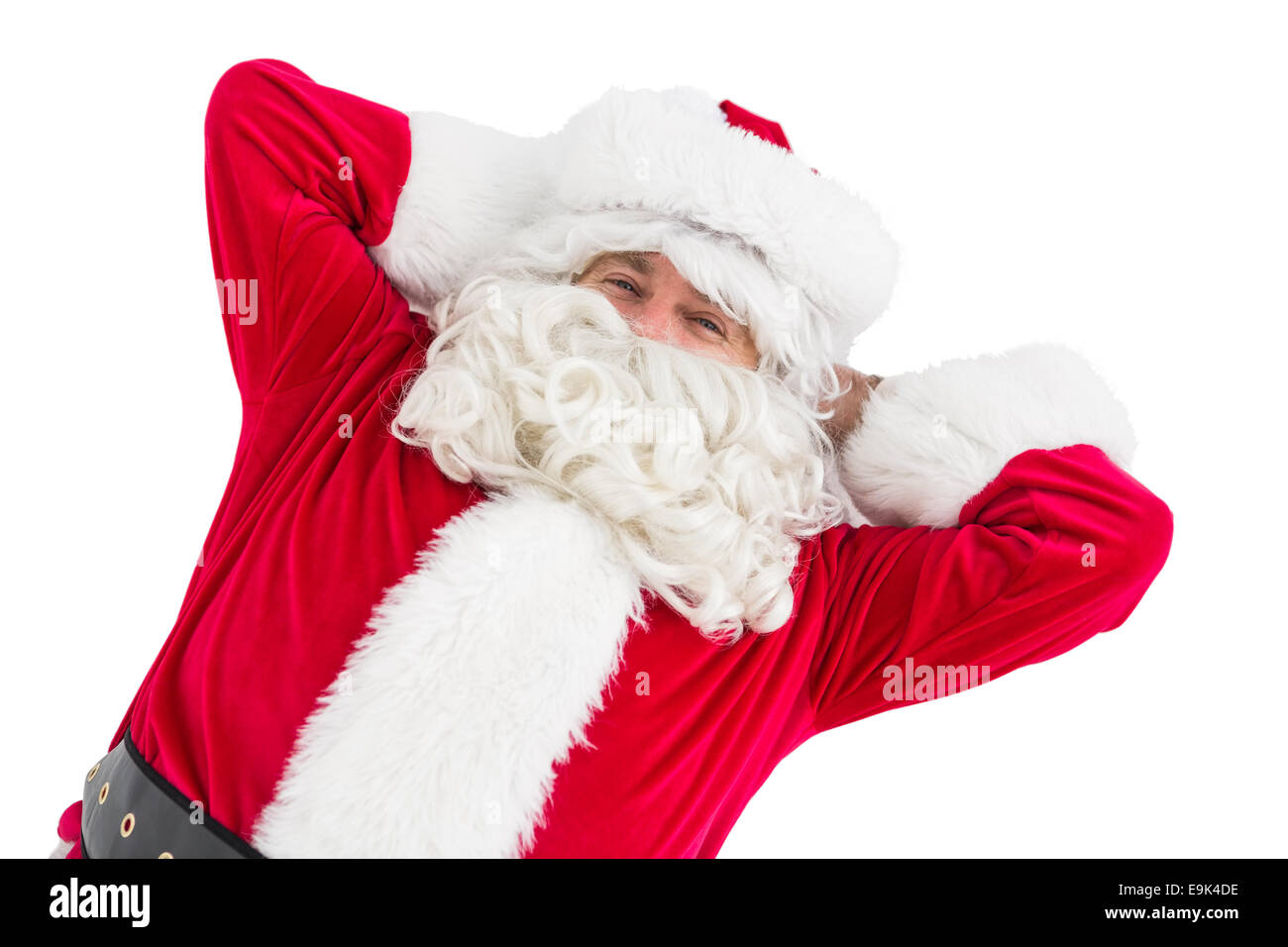 Happy santa lying and relaxing Stock Photo - Alamy