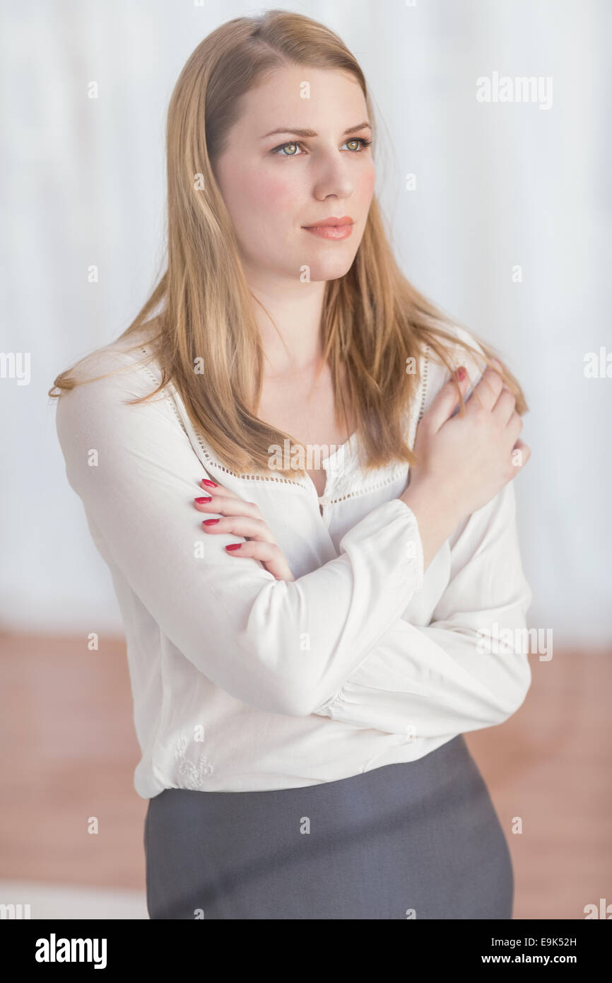 Cold pretty young woman shivering Stock Photo - Alamy
