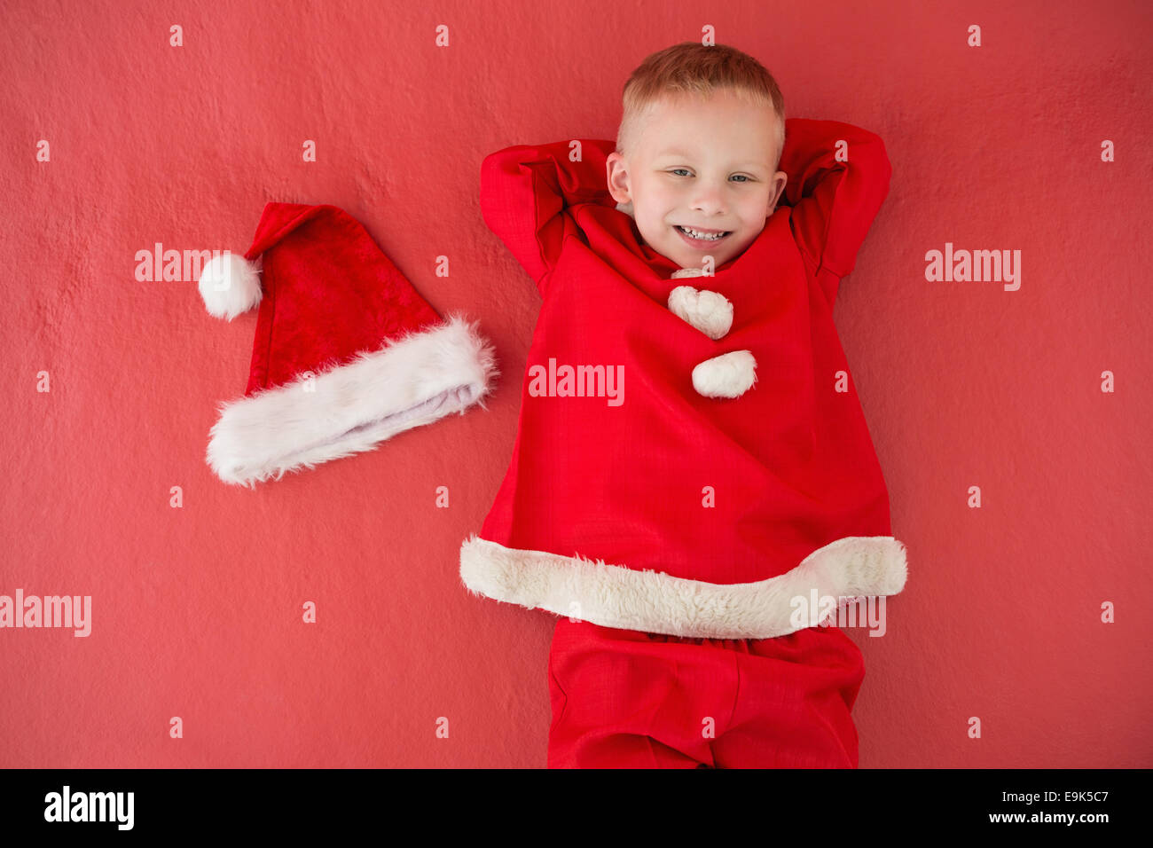 Little boy in santa costume Stock Photo - Alamy