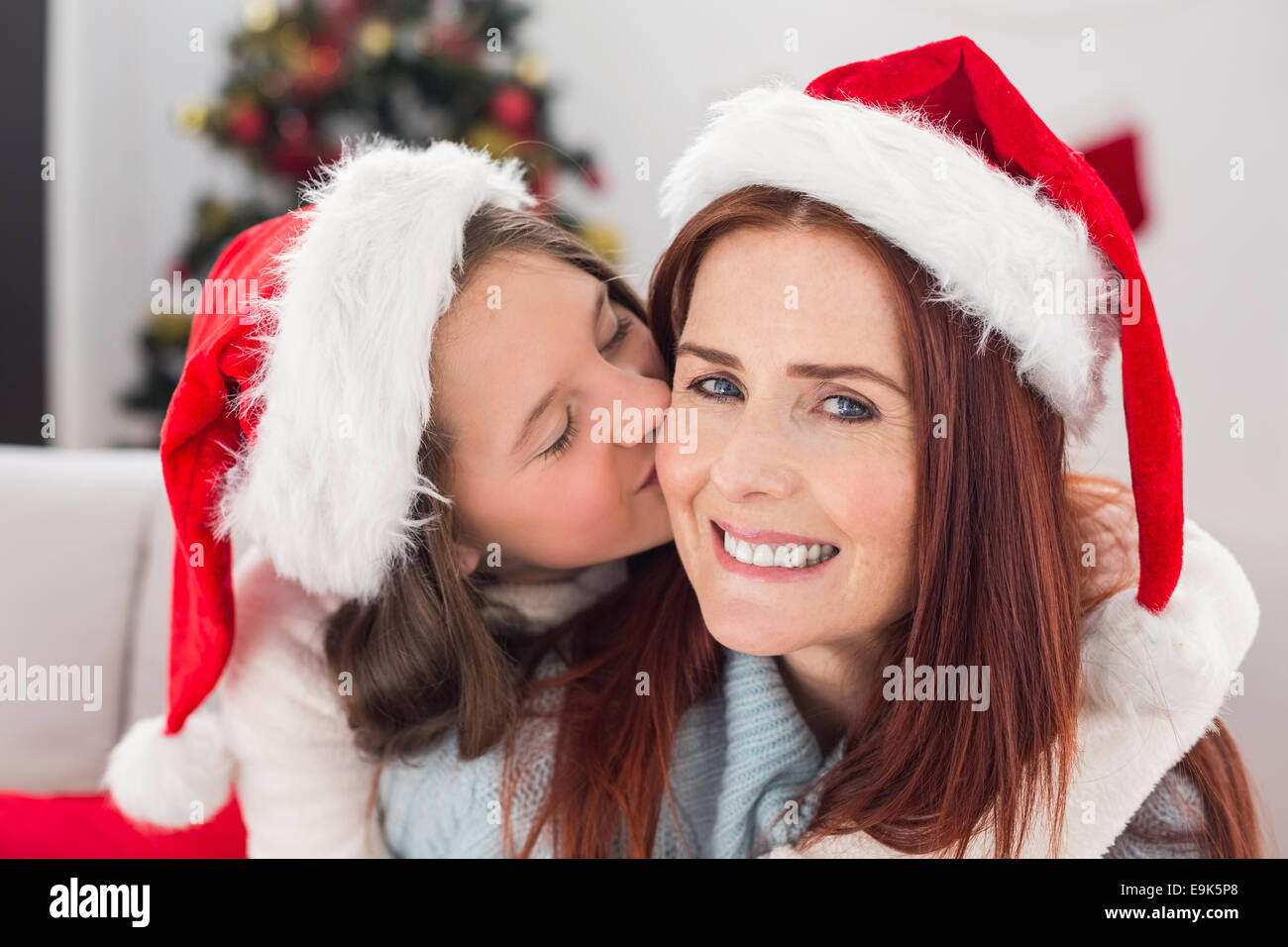 Red santa hat on couch hi-res stock photography and images - Alamy