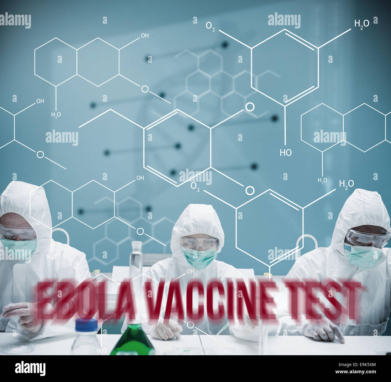 Chemists working in protective suit with futuristic interface showing ...
