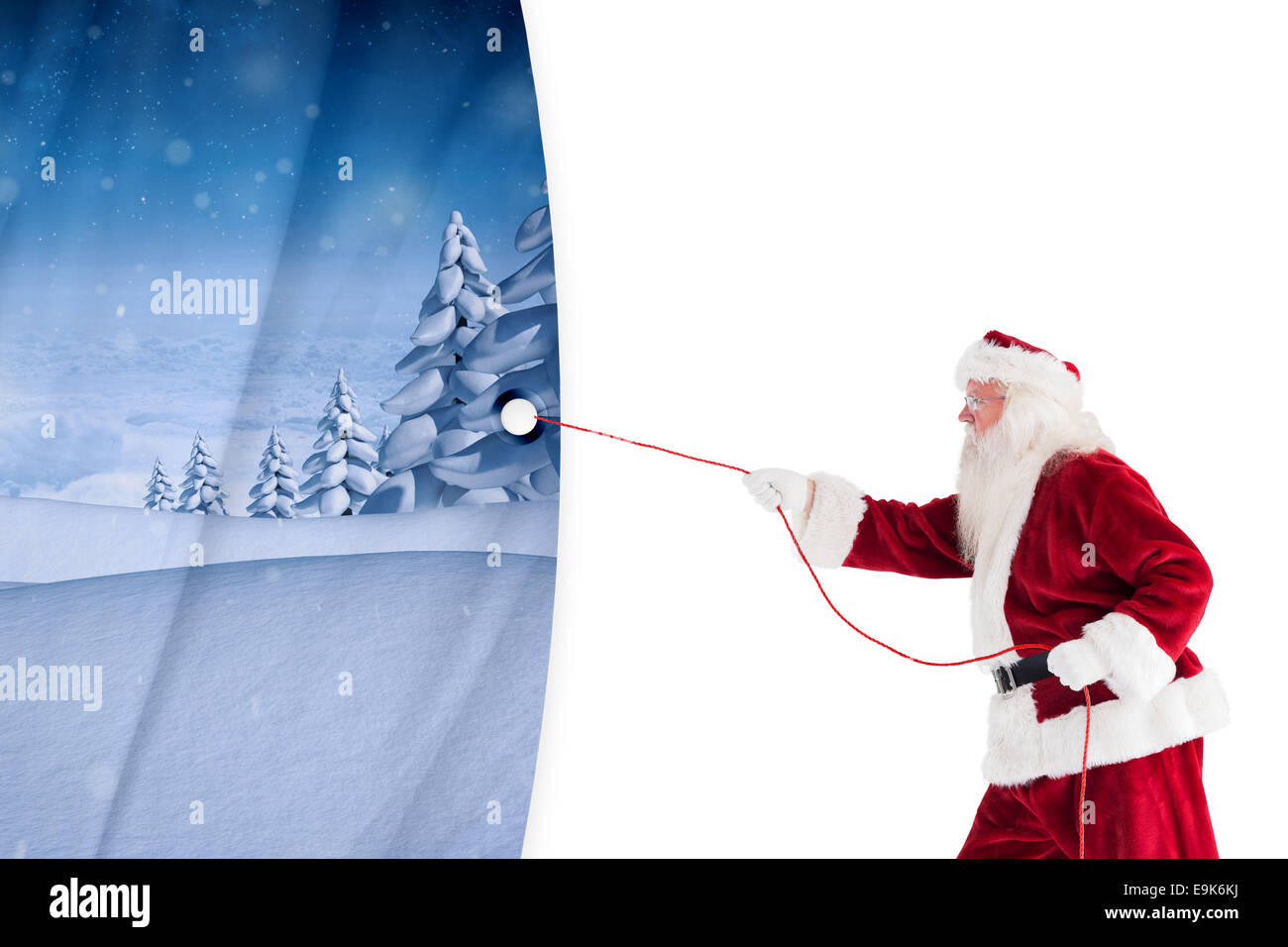 Santa claus pulling a rope Stock Photo - Alamy