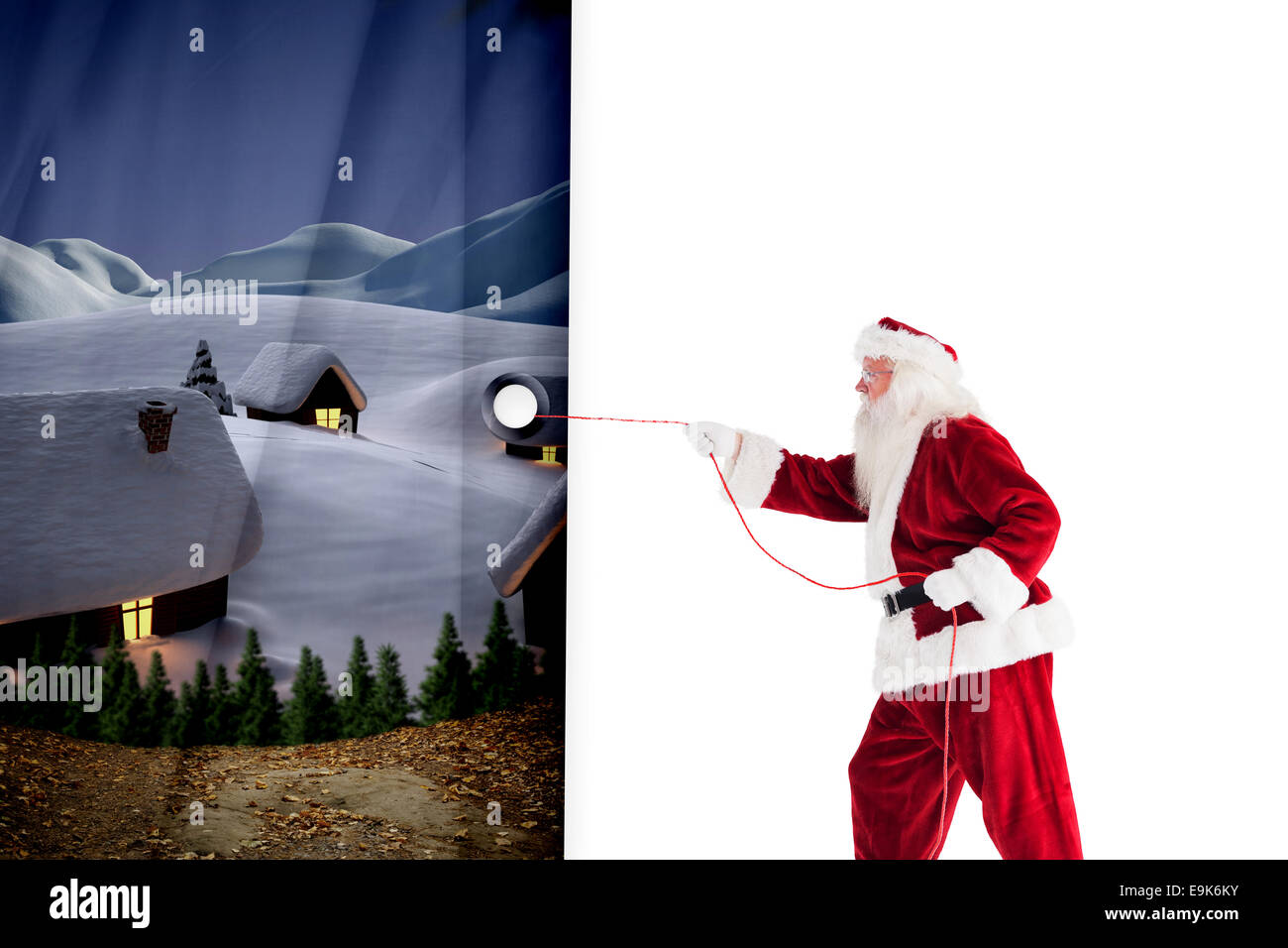 Santa claus pulling a rope Stock Photo - Alamy