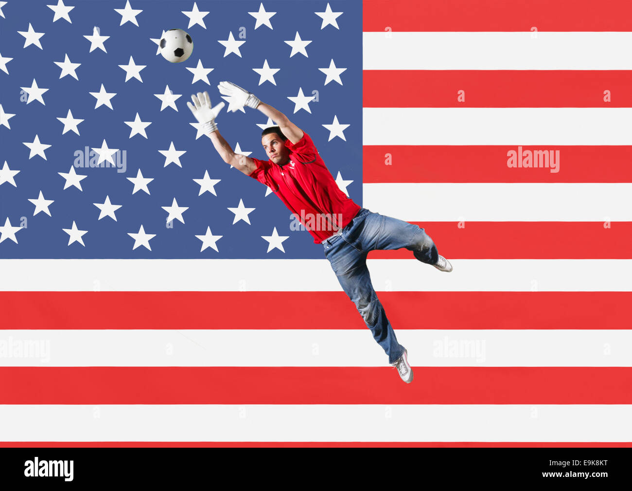 Football Goalkeeper saving shot in front of USA National Flag Stock ...
