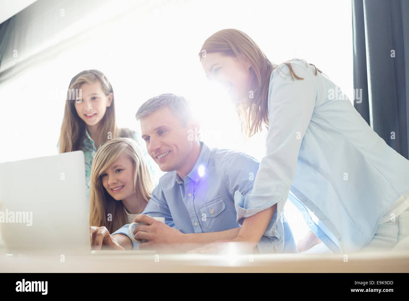 Teen girl with parents hi-res stock photography and images - Alamy
