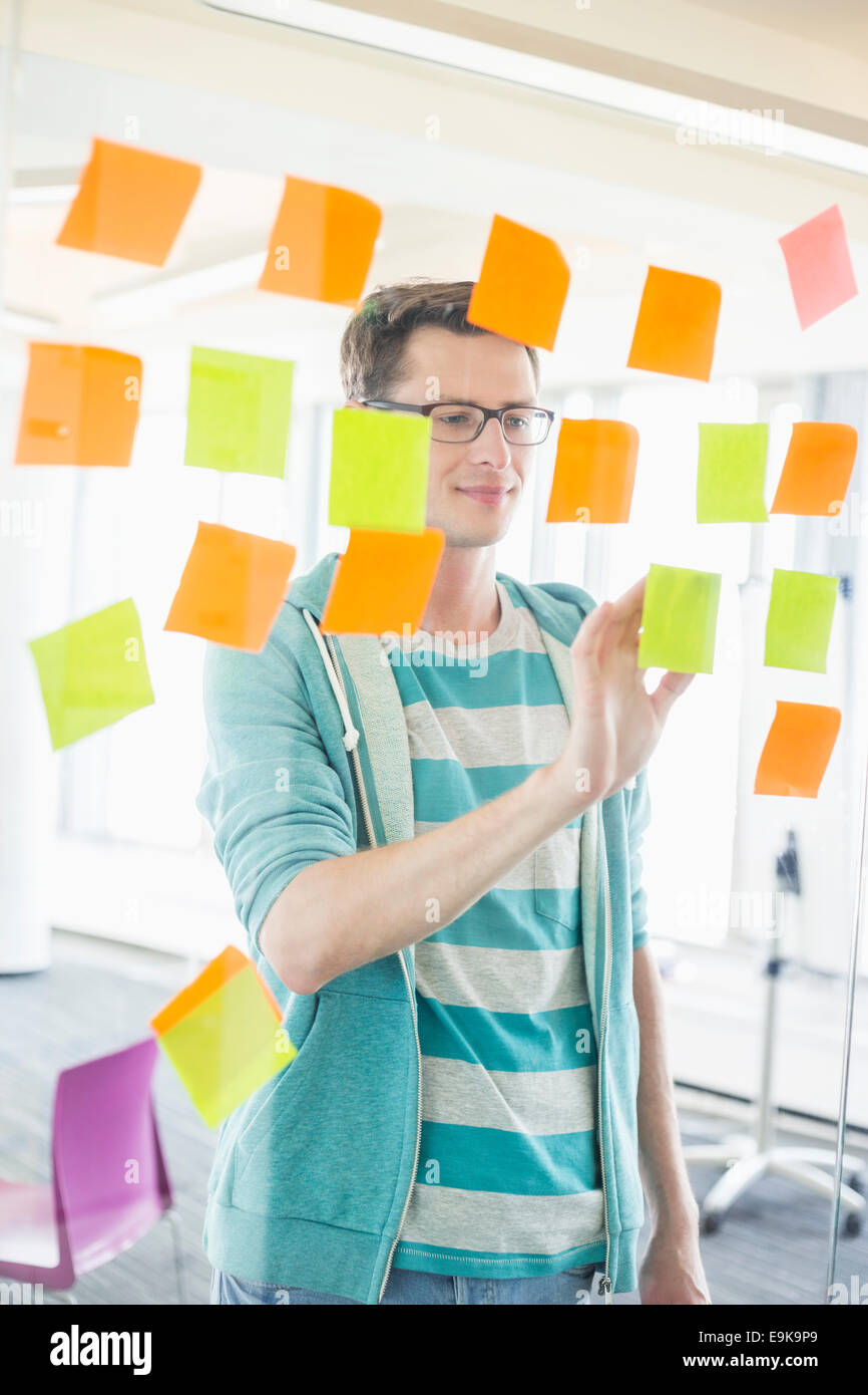 Person and sticky notes on wall hi-res stock photography and images - Alamy