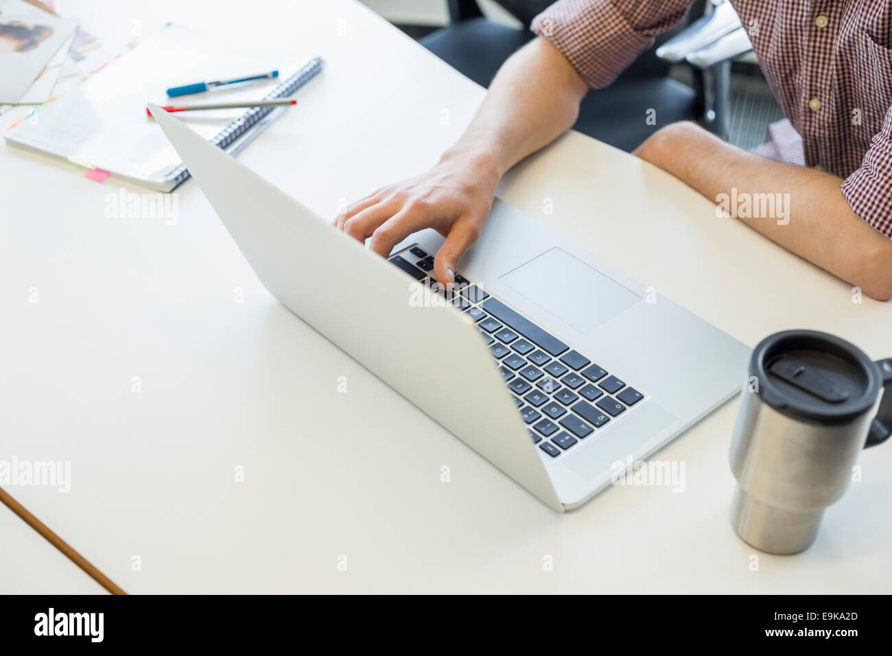 Man sitting desk using laptop hi-res stock photography and images - Alamy