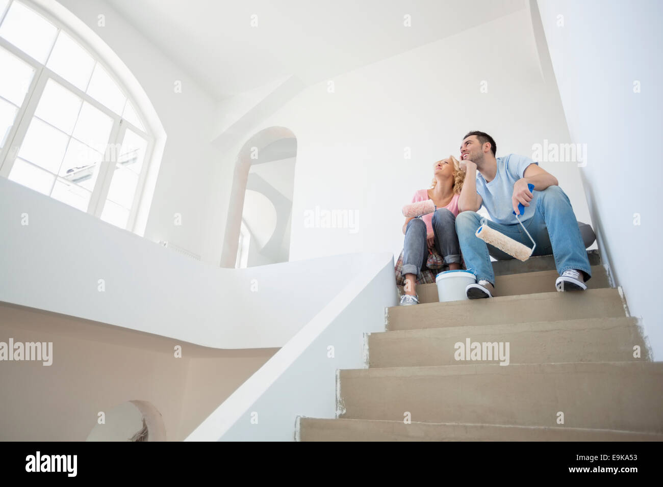 Woman sitting on steps painting hi-res stock photography and images - Alamy