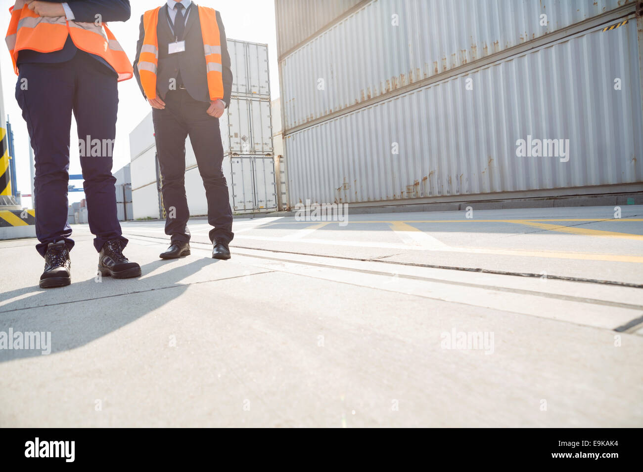 Two standing workers hi-res stock photography and images - Alamy