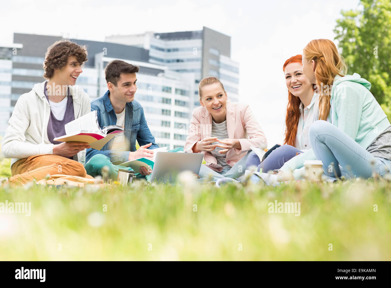 University students studying together on grass Stock Photo - Alamy