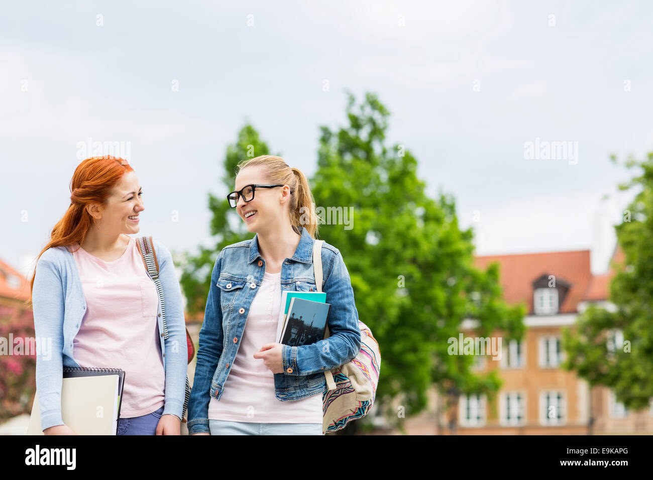 Smiling walking outdoors hi-res stock photography and images - Alamy
