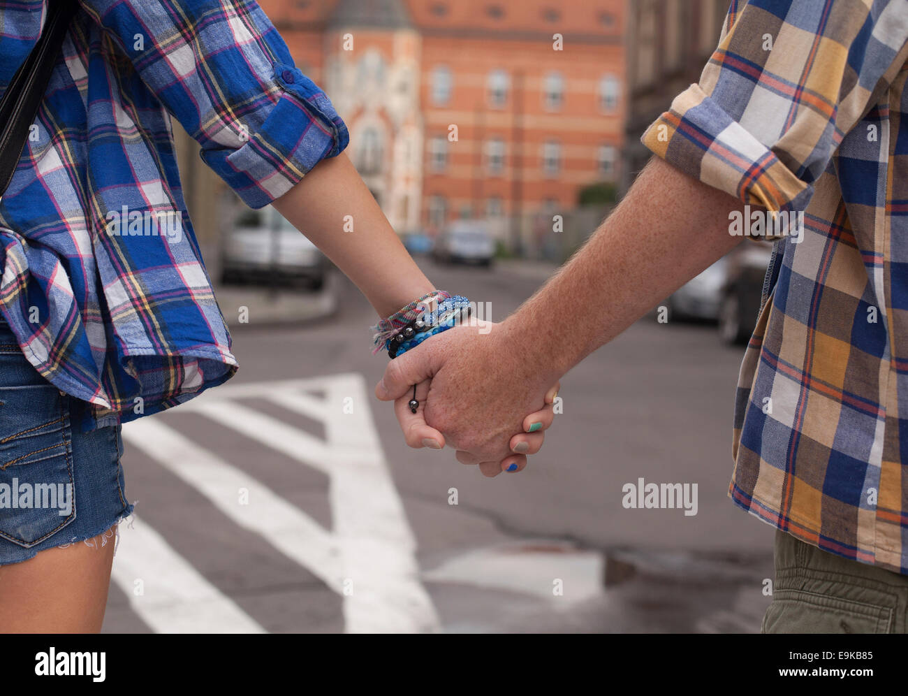 Hands of young couple on the street in Europe, close-up shoot Stock ...