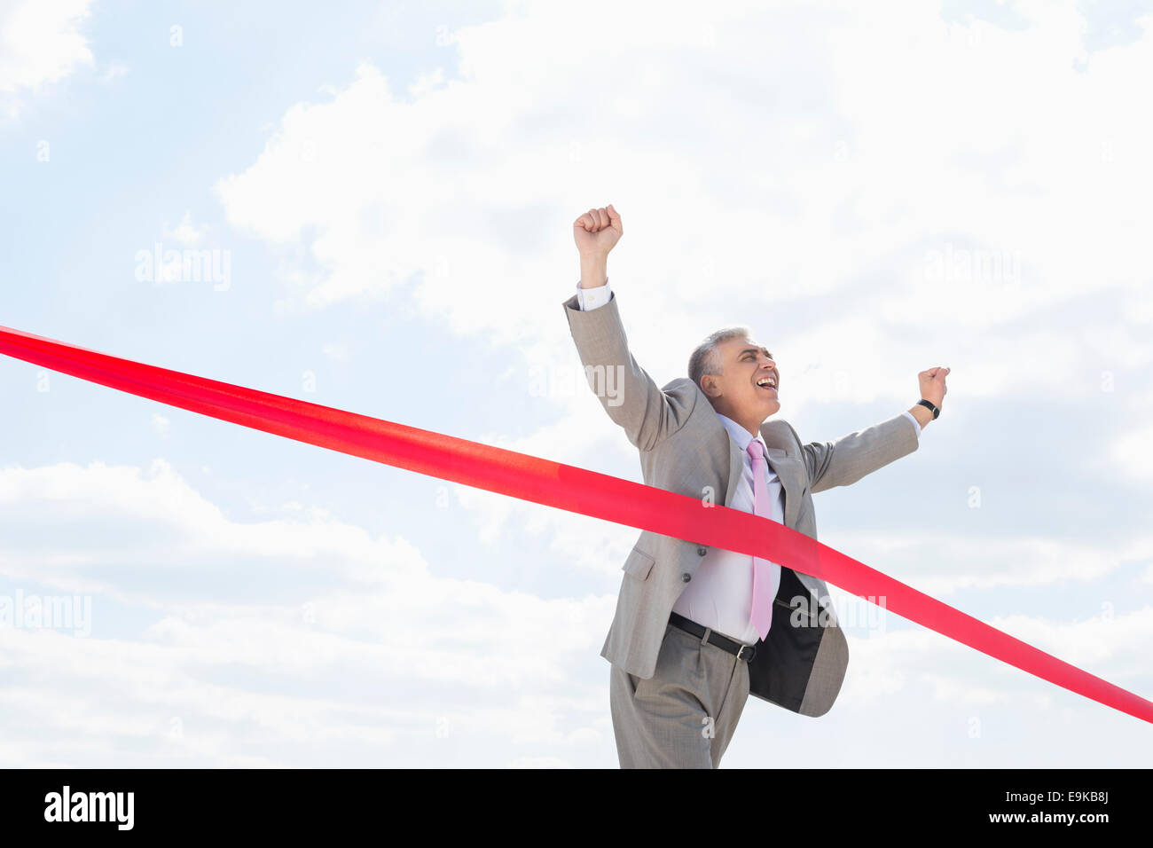 Crossing the finish line hi-res stock photography and images - Alamy