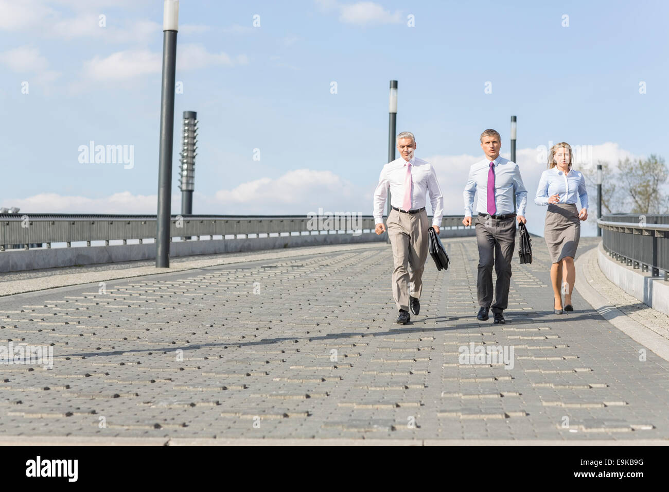 Young people walking on bridge hi-res stock photography and images - Alamy