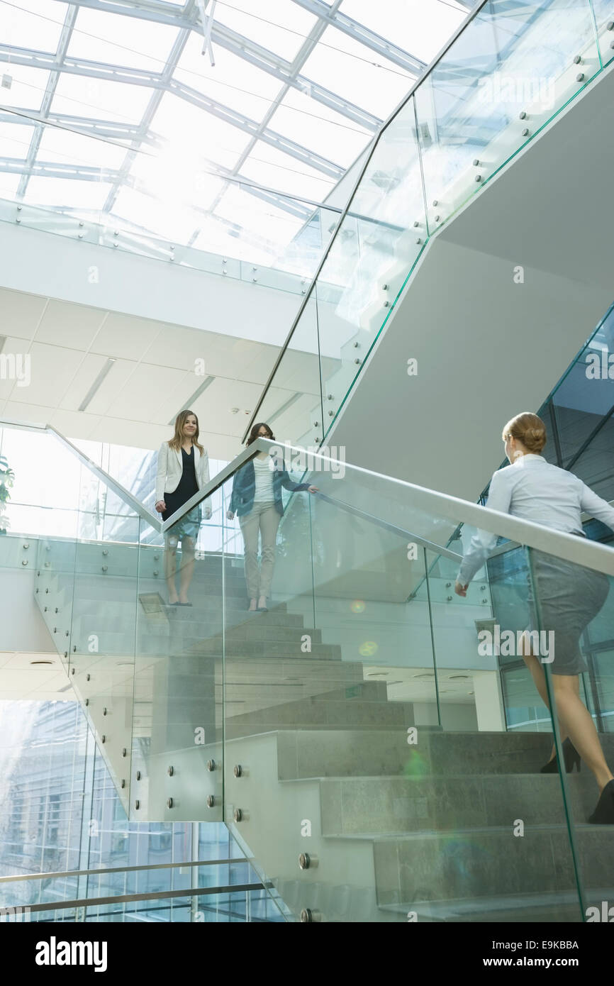 Businesswomen walking on steps in hi-res stock photography and images ...