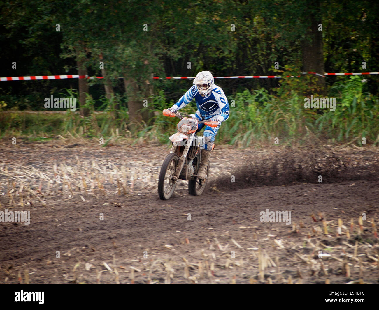 Speeding KTM offroad motorcycle at the annual enduro rallye in Ruurlo ...