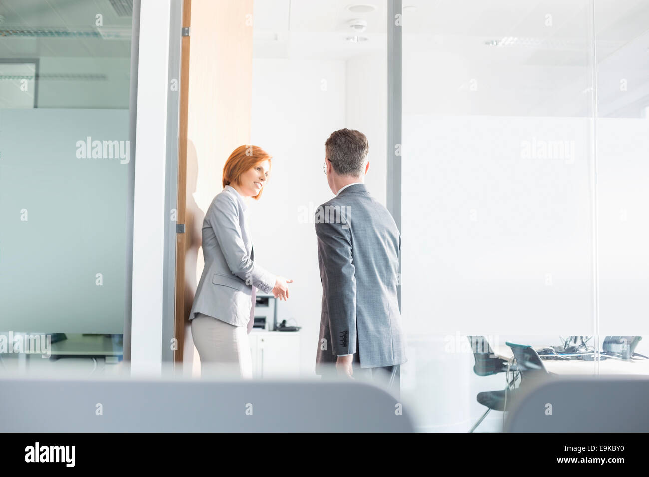 Business people entering into conference room Stock Photo - Alamy