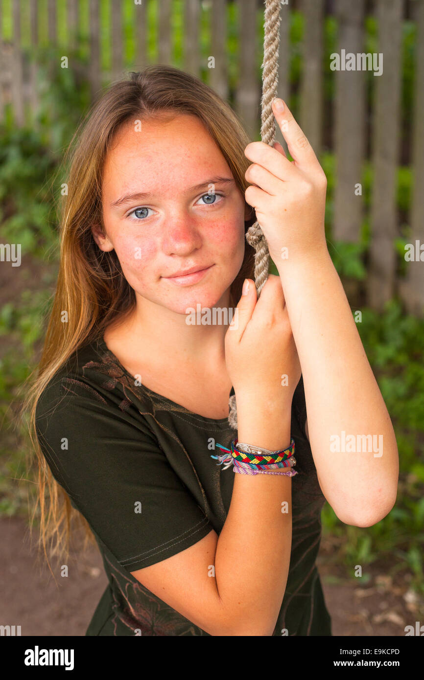 Girl swing rope hi-res stock photography and images - Alamy
