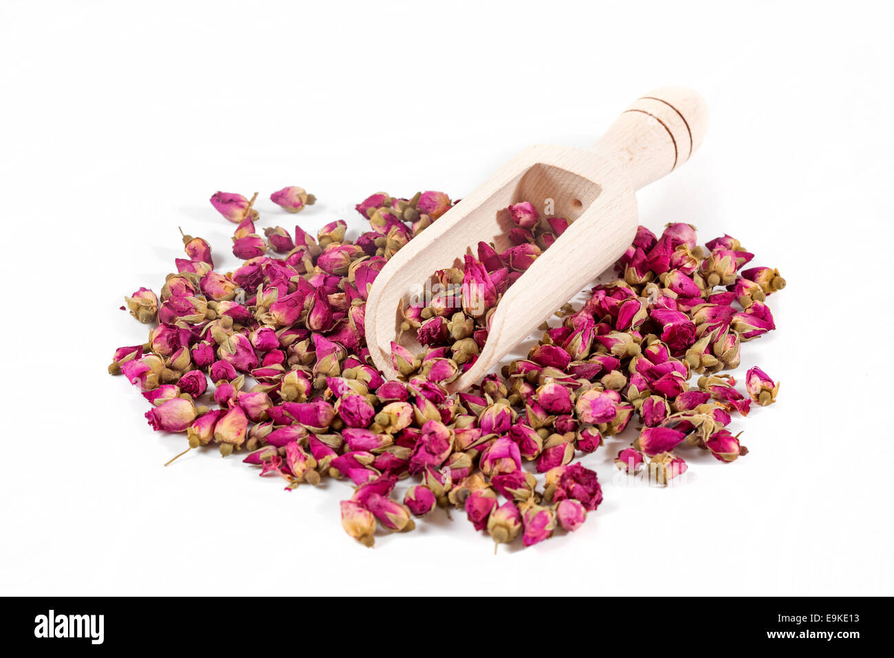 Dried rose buds on the white background Stock Photo - Alamy