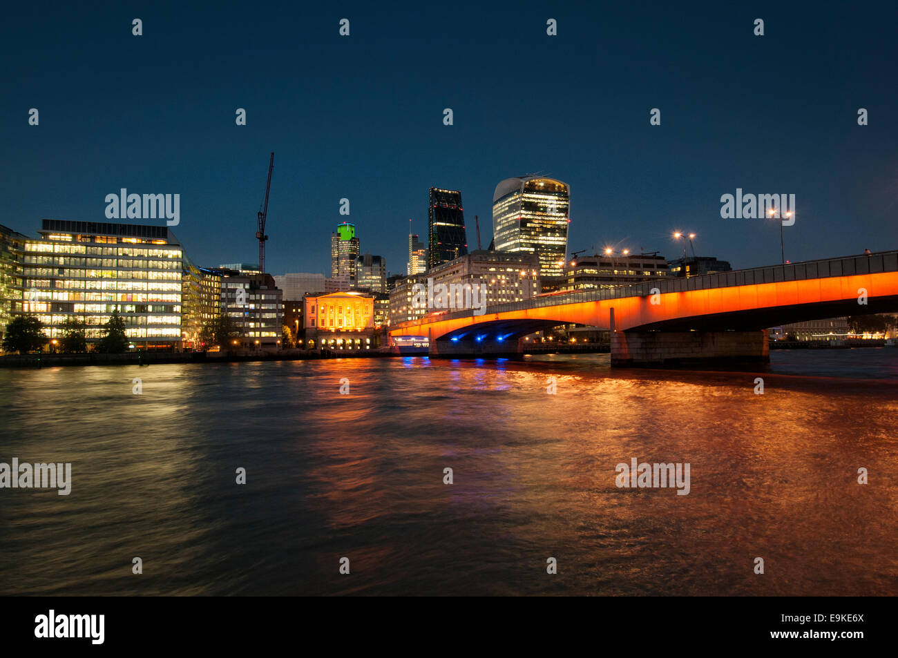 London Bridge, the city and River Thames at night Stock Photo - Alamy