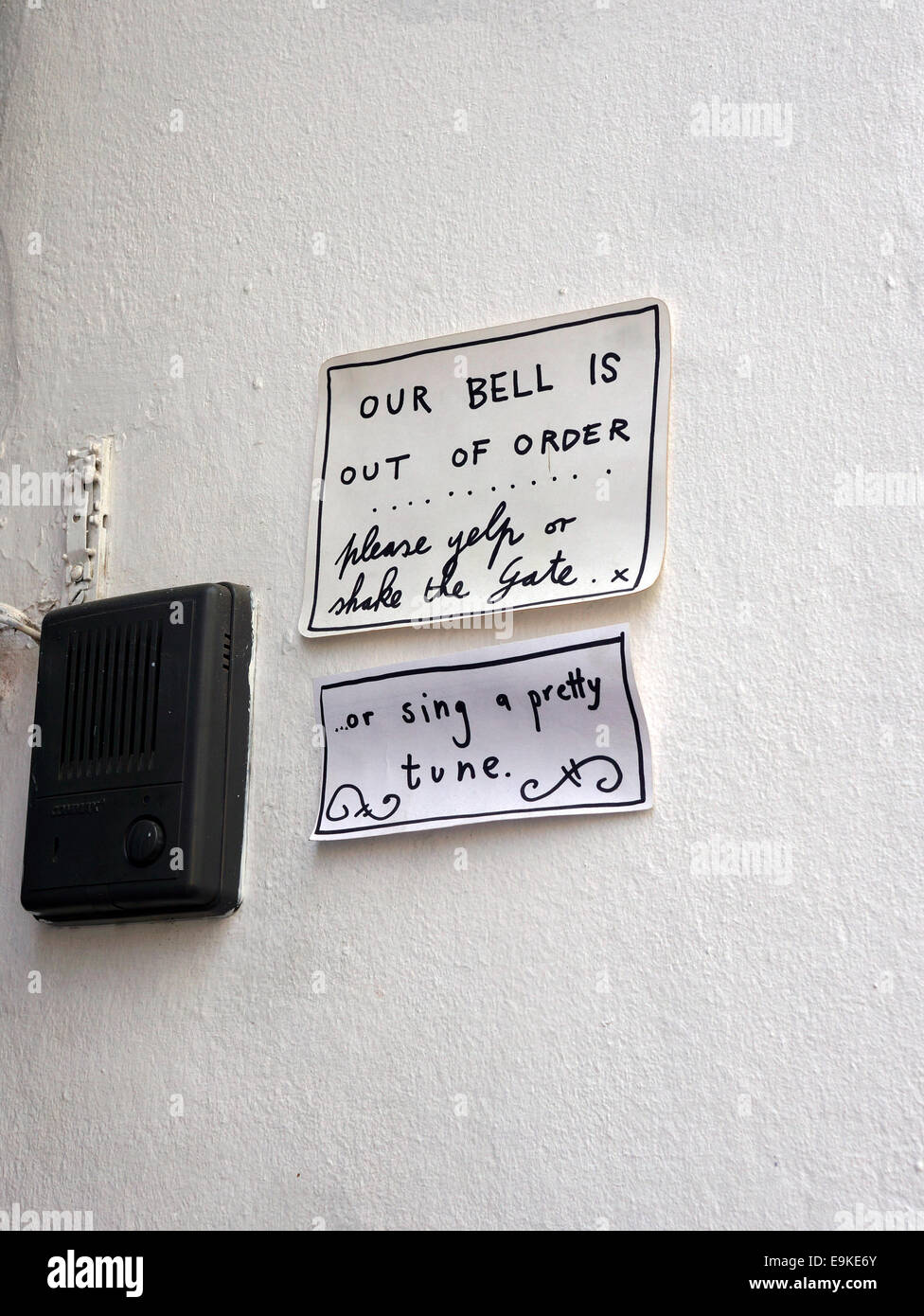 Funny sign at door intercom in Cape Town : " Our bell is out of order ...