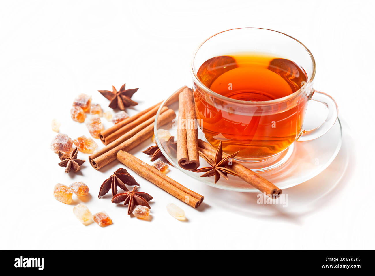 Cup of tea with condiments on white background Stock Photo - Alamy