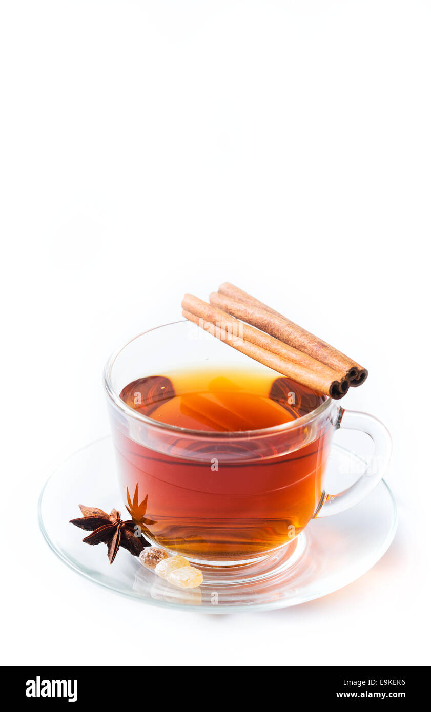 Cup of tea with condiments on white background Stock Photo - Alamy