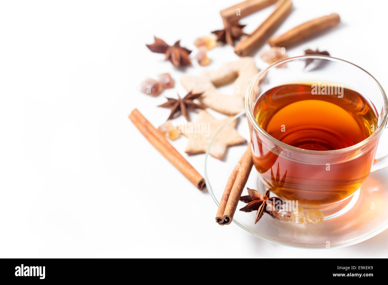 Cup of tea with condiments on white background Stock Photo - Alamy