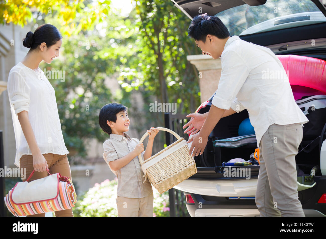 Young family going for a picnic Stock Photo - Alamy