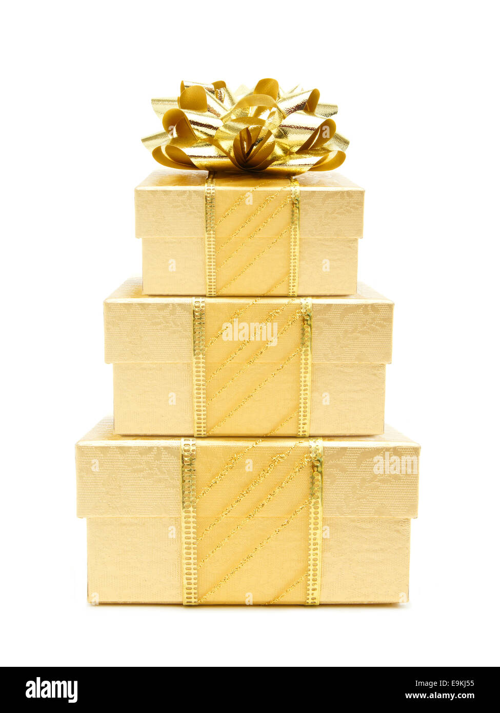 Stack of gold Christmas gifts isolated on white Stock Photo - Alamy
