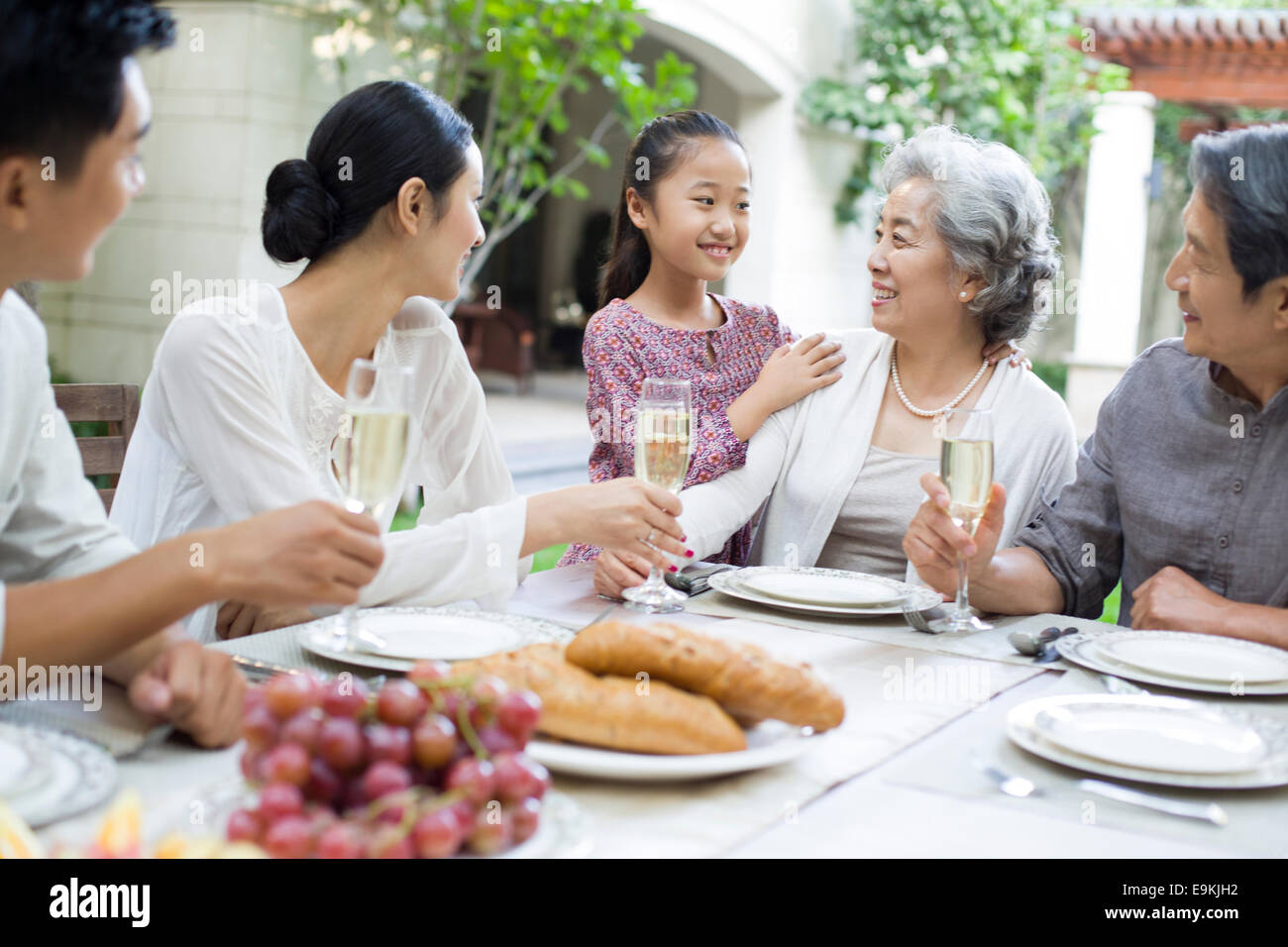 Chinese family eating meal hi-res stock photography and images - Alamy